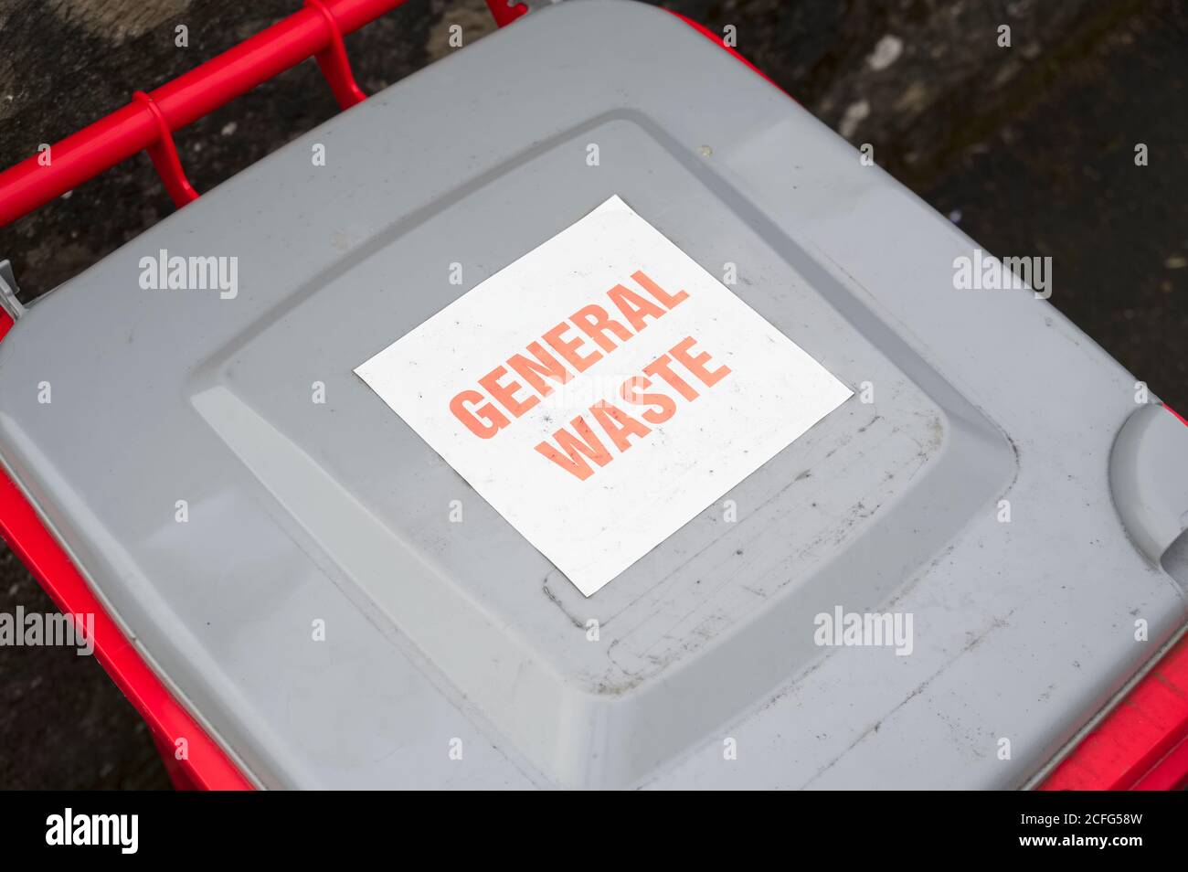 General waste red recycle wheelie bin with grey lid Stock Photo - Alamy