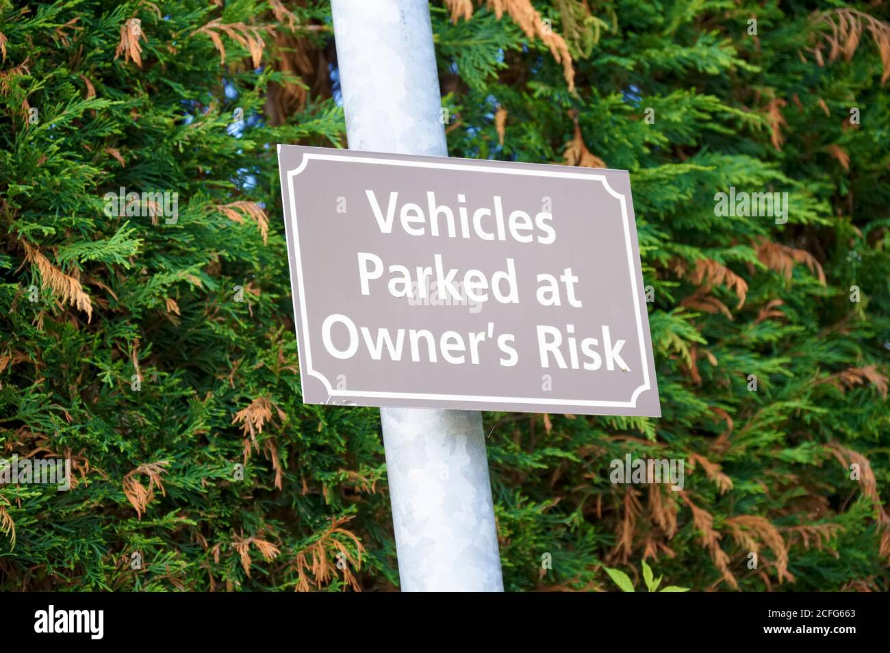Car park users do so at own risk sign Stock Photo - Alamy Car park users do so at own risk sign Stock Photo - Alamy