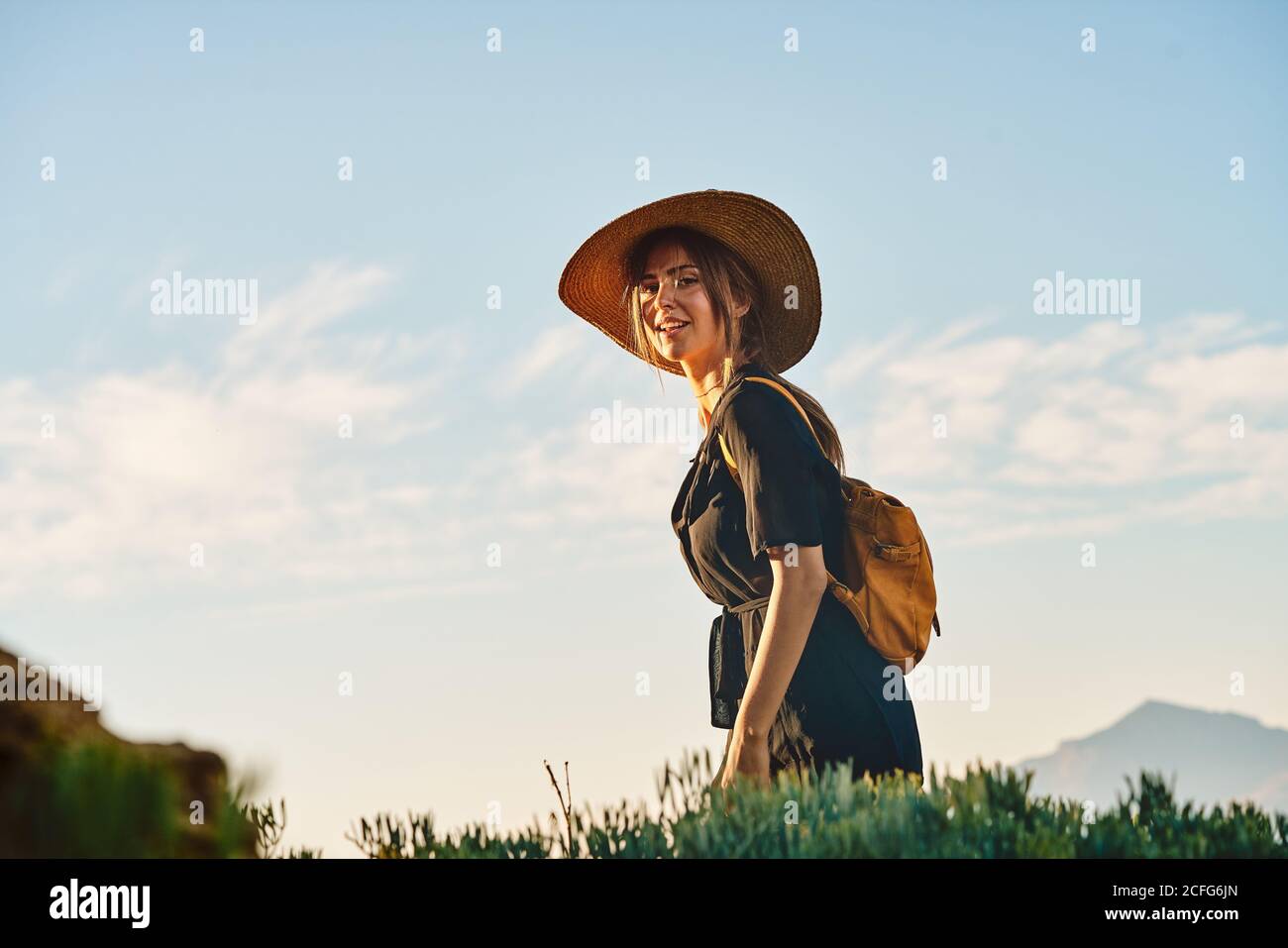 Straw hat backpack hi-res stock photography and images - Alamy
