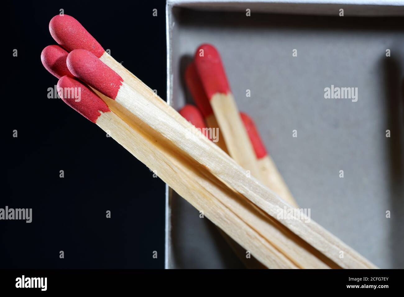 Lit matches and blown out in the studio photographed with colorful ...