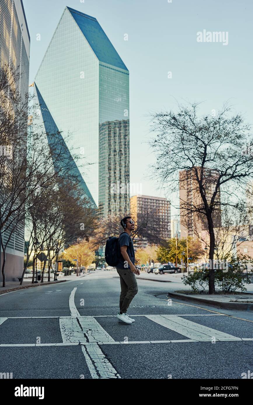 Attractive African American female with curly hair and in casual ...