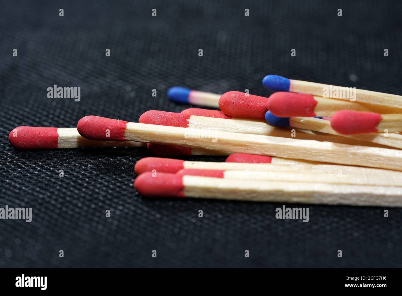 Lit matches and blown out in the studio photographed with colorful ...