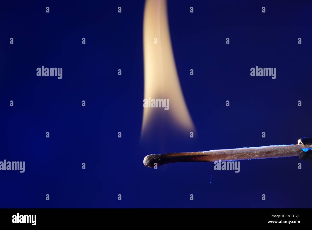 Lit matches and blown out in the studio photographed with colorful ...