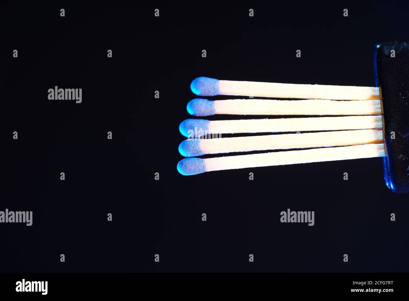 Lit matches and blown out in the studio photographed with colorful ...