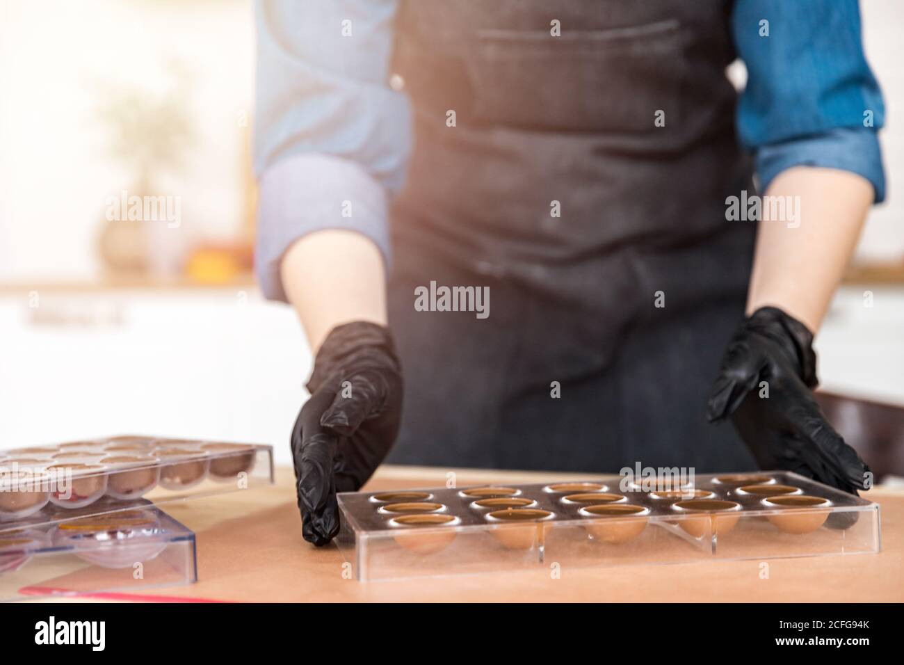 Chocolatier making chocolate hi-res stock photography and images - Alamy