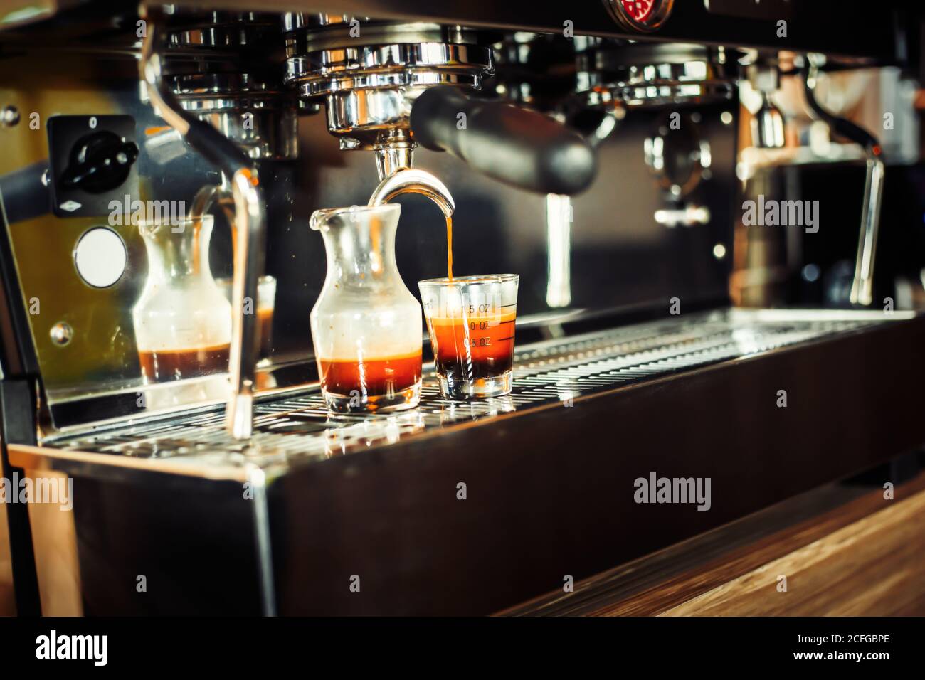 The machine coffee and water coffee in the cup of coffee Stock Photo ...