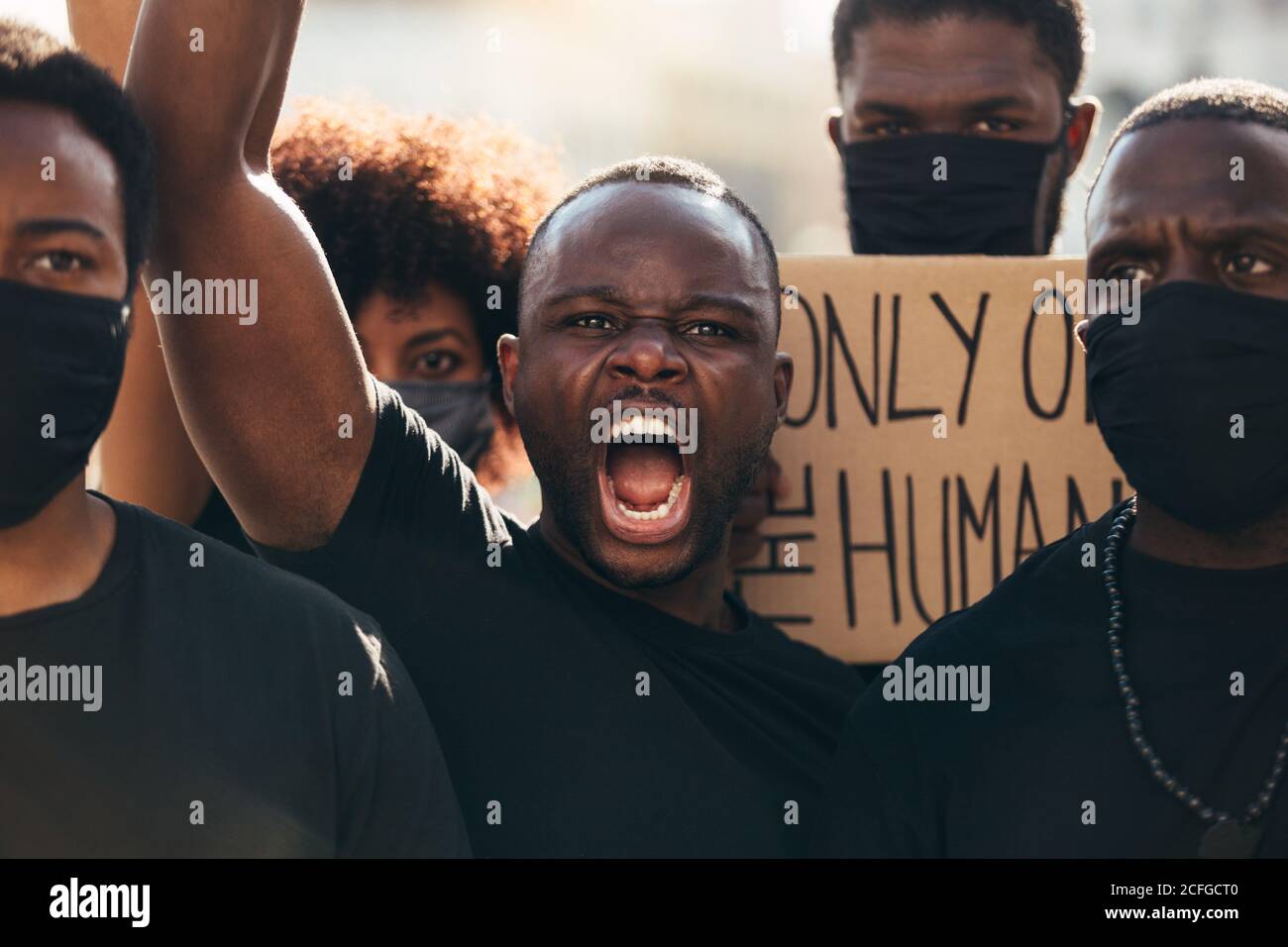 People protesting at a rally for racial equality. Black Lives Matter ...