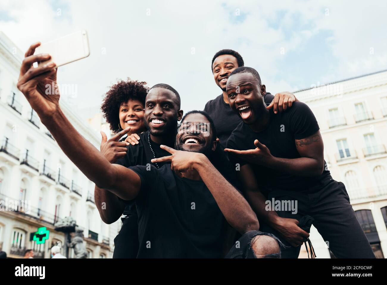 Group of black race friends taking a selfie Stock Photo - Alamy