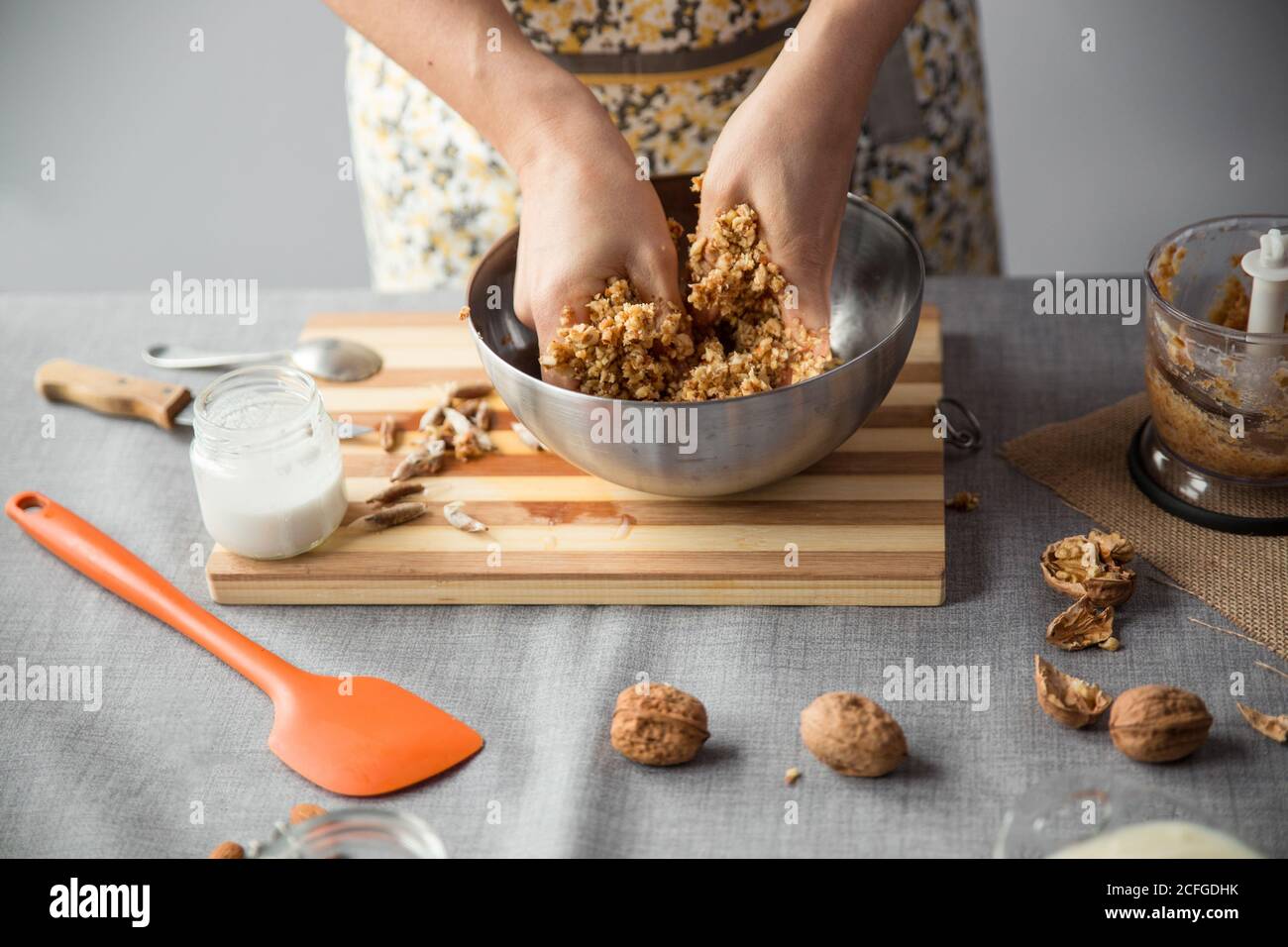 Woman mashing blender mixture into a bowl Stock Photo - Alamy