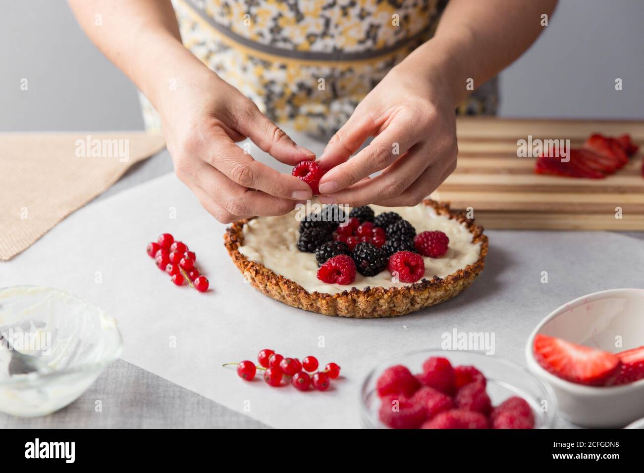Woman preparing a cake Stock Photo - Alamy