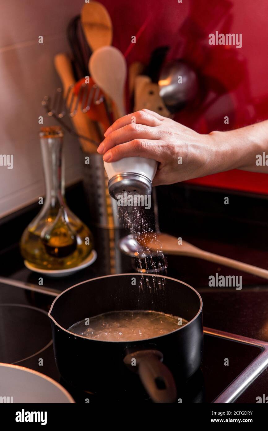 Salt woman cooking hi-res stock photography and images - Alamy