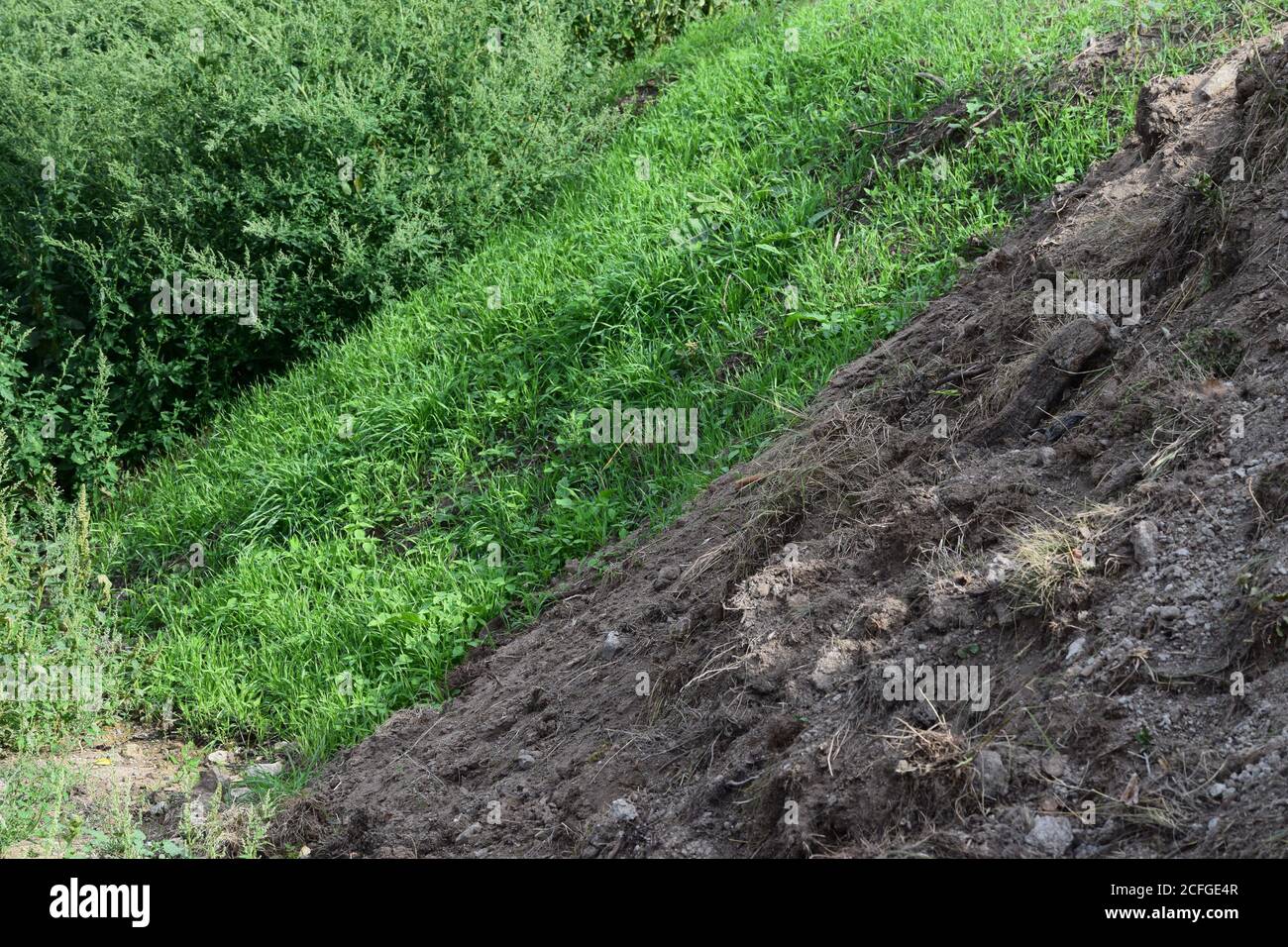 three different Mounds of Earth Stock Photo - Alamy