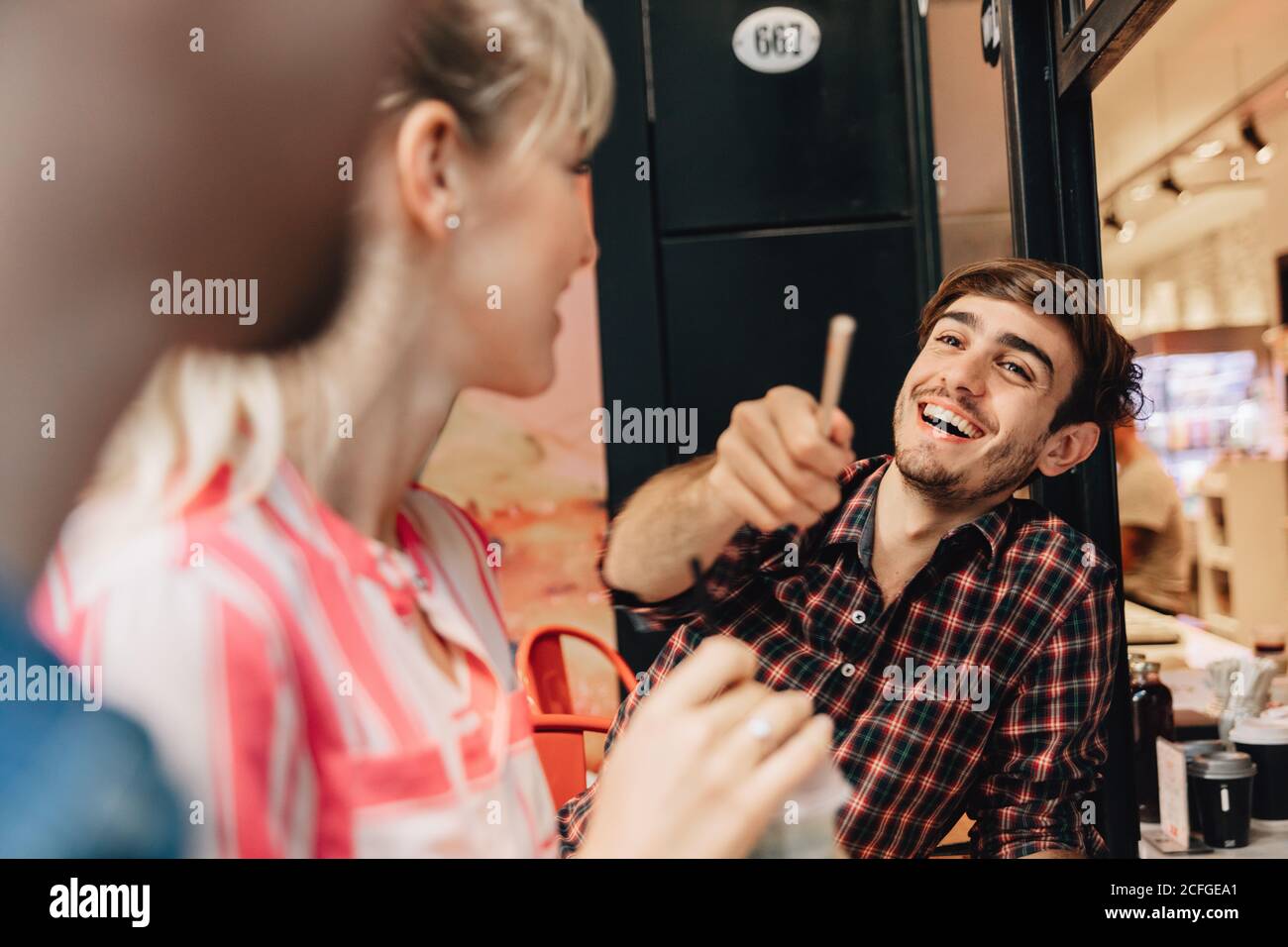 Men drinking bar stool hi-res stock photography and images - Alamy