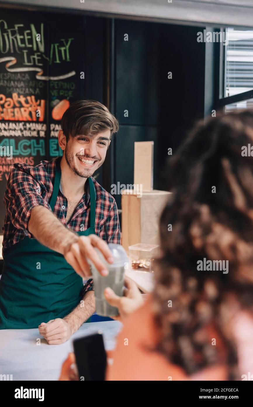 Handing cocktail hi-res stock photography and images - Alamy