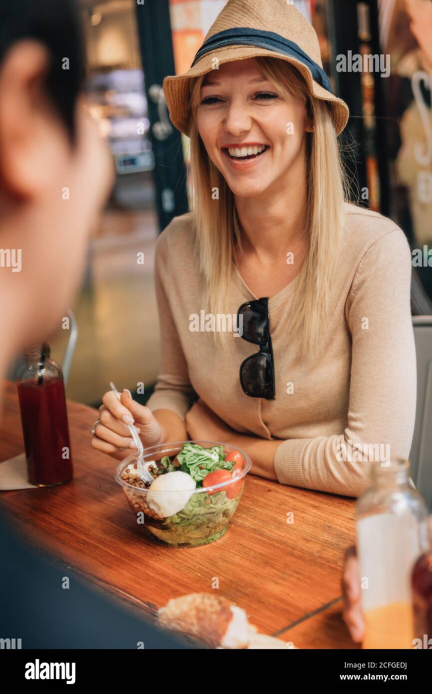 Diverse friends eating restaurant hi-res stock photography and images ...