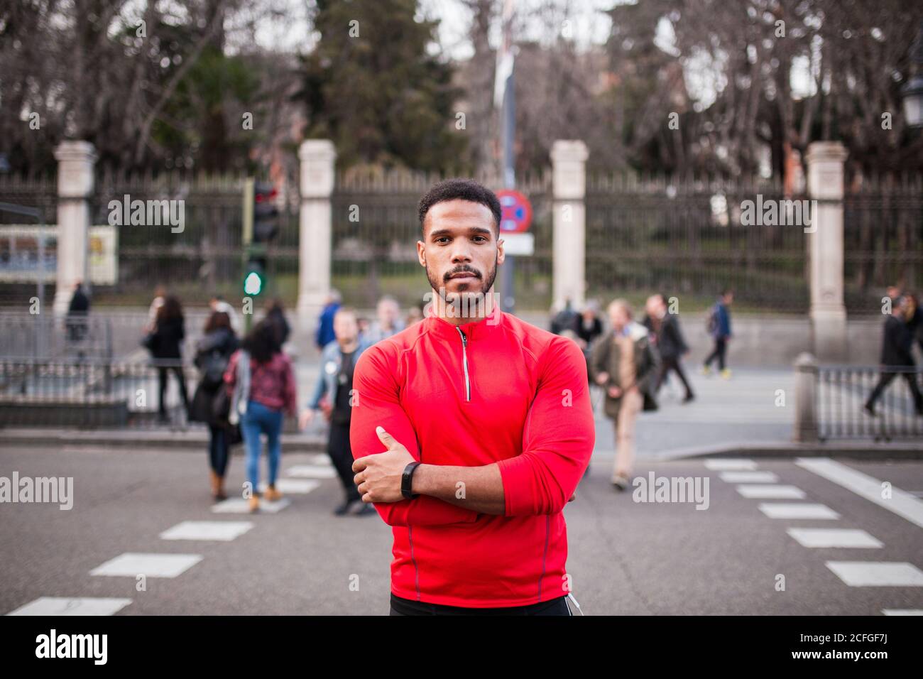 Young man standing around the city wearing sportswear Stock Photo - Alamy