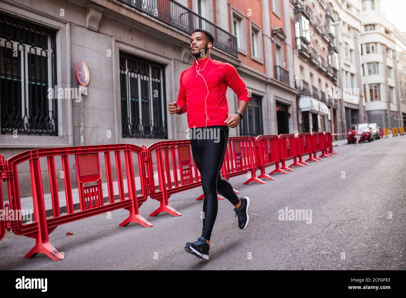 Running city streets black male hi-res stock photography and images - Alamy
