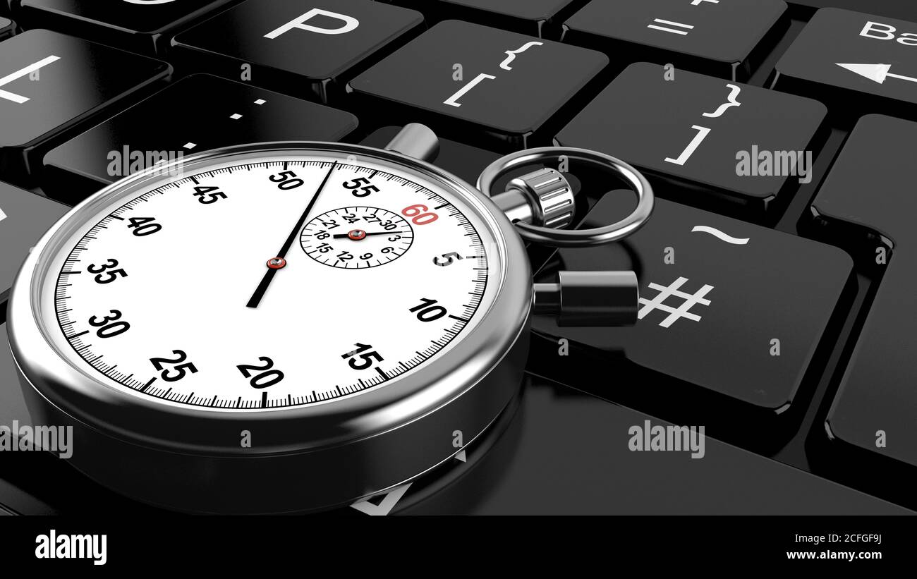 Stopwatch lying on computer keyboard Stock Photo - Alamy