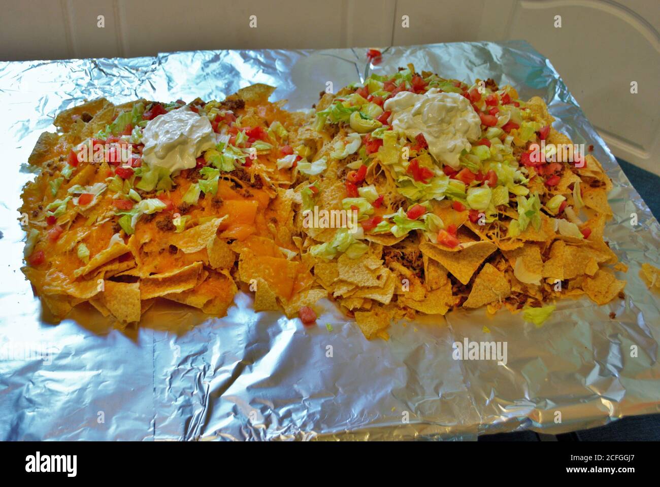 Nacho table kitchen table wrapped in aluminum foil and covered with ...