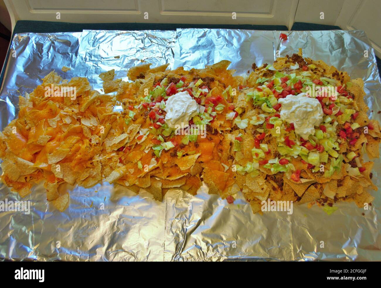 Nacho table kitchen table wrapped in aluminum foil and covered with ...