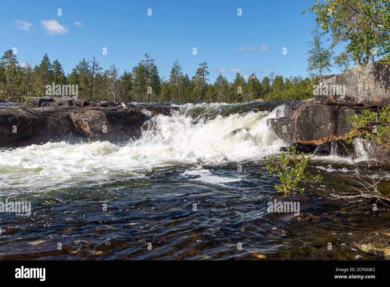 Downstream Trollforsen rapid in Pite river with a little waterfall in ...