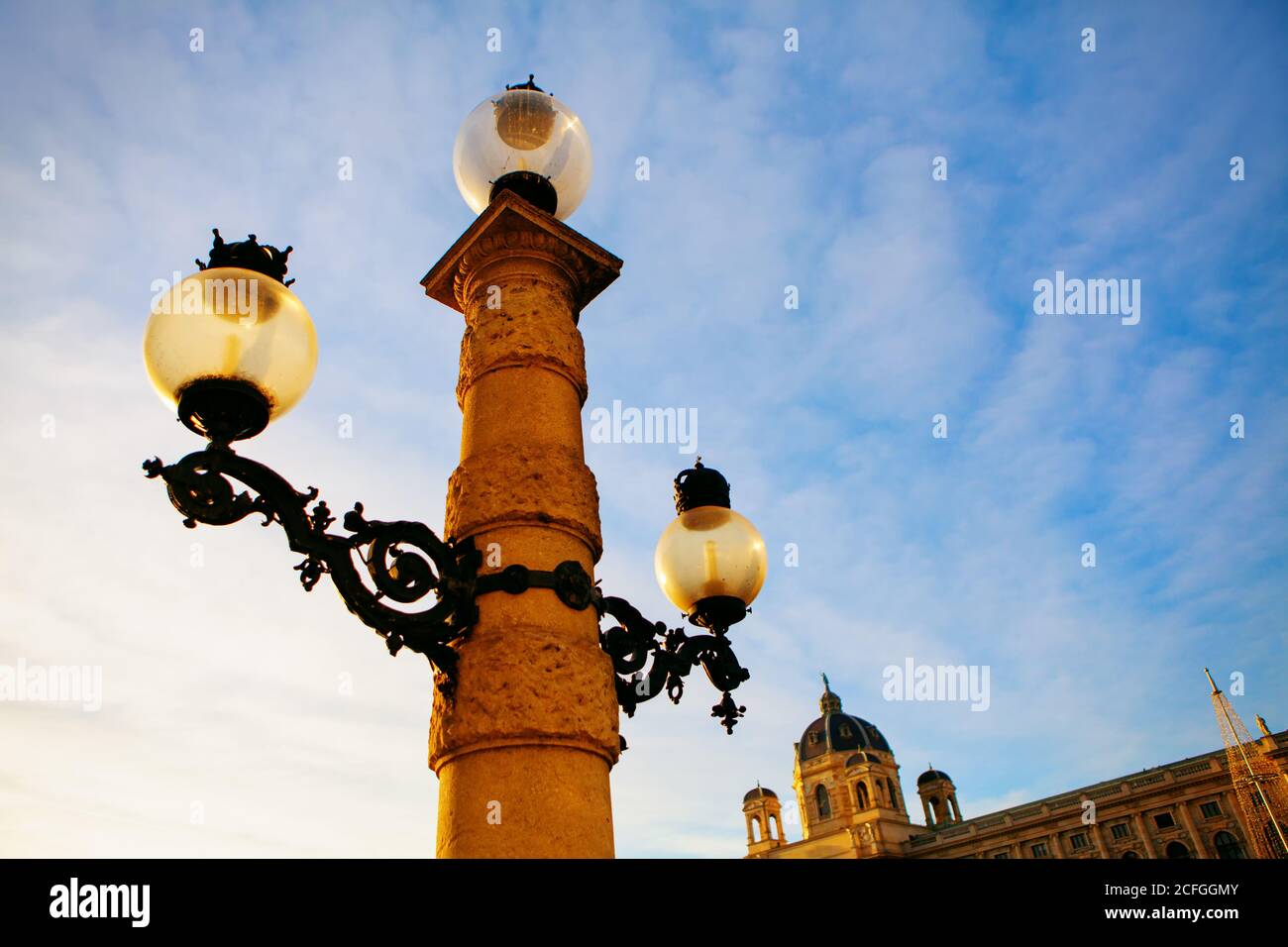 Column with street lamps in the Twilight Stock Photo - Alamy