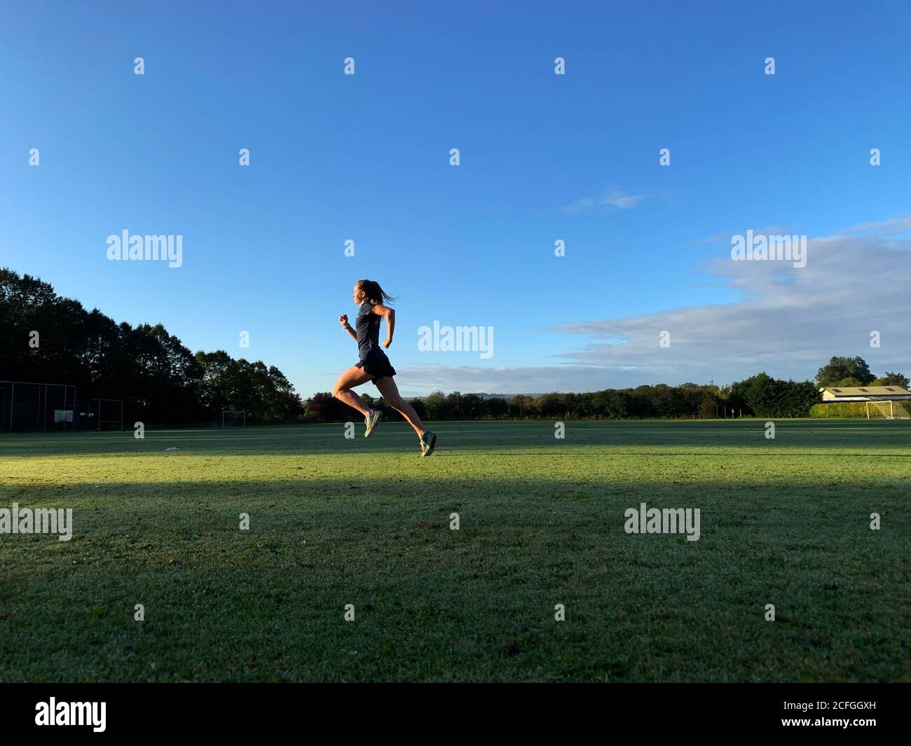 Teenage girl run training, UK Stock Photo - Alamy