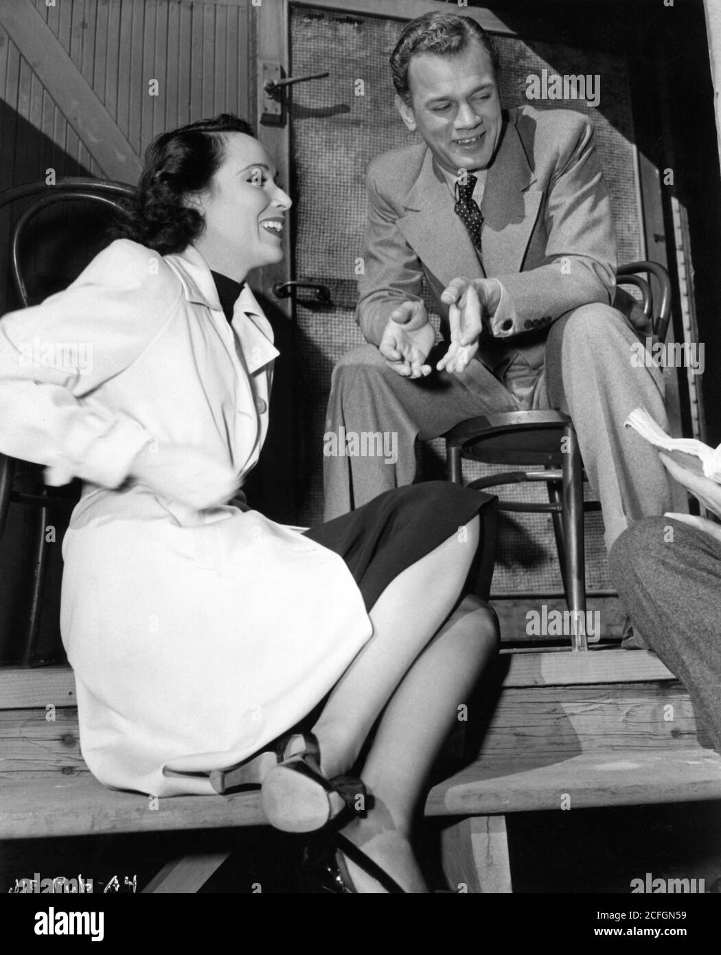 DOLORES DEL RIO and JOSEPH COTTEN on set candid during filming of ...