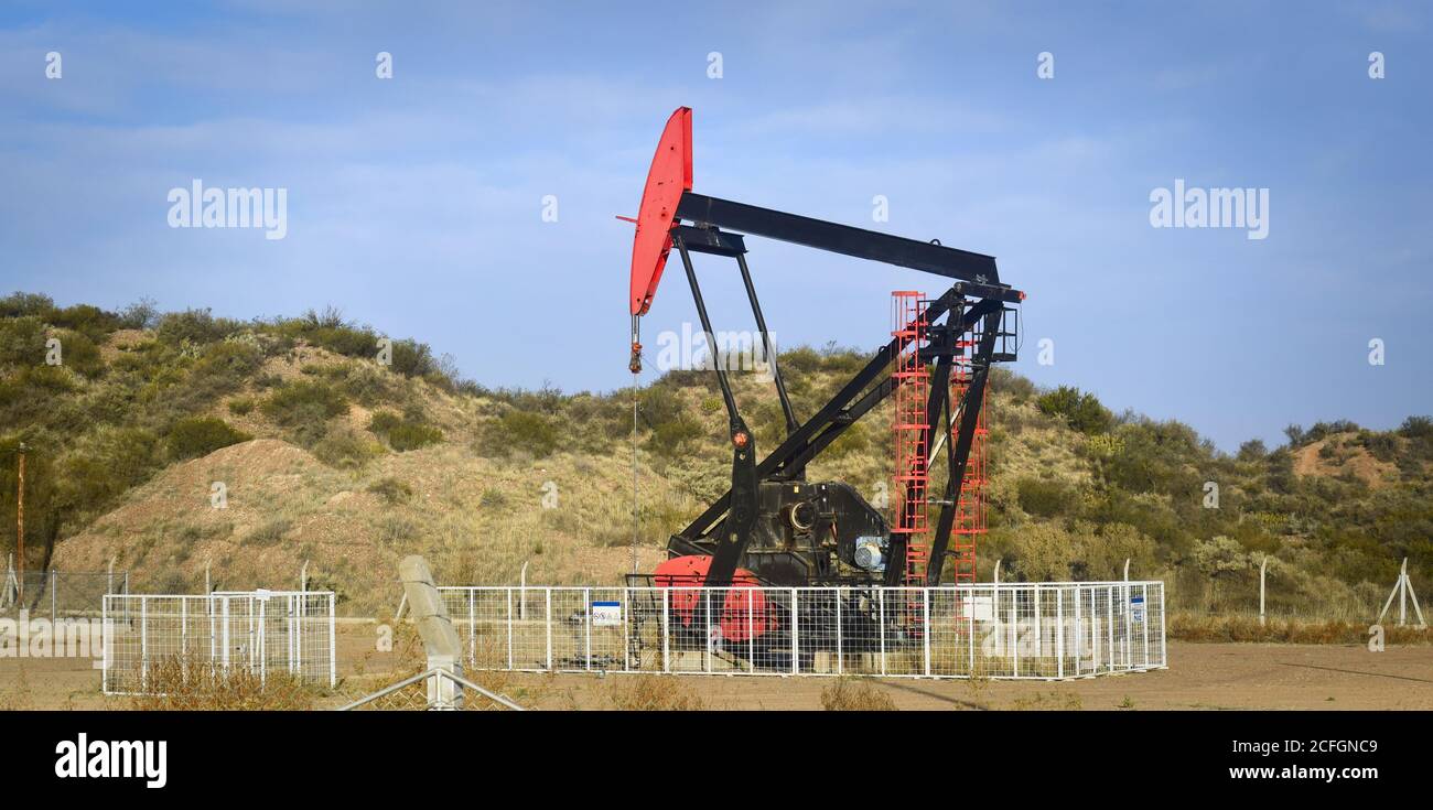 Oil extraction pumpjack in the desert of Mendoza, Argentina Stock Photo ...