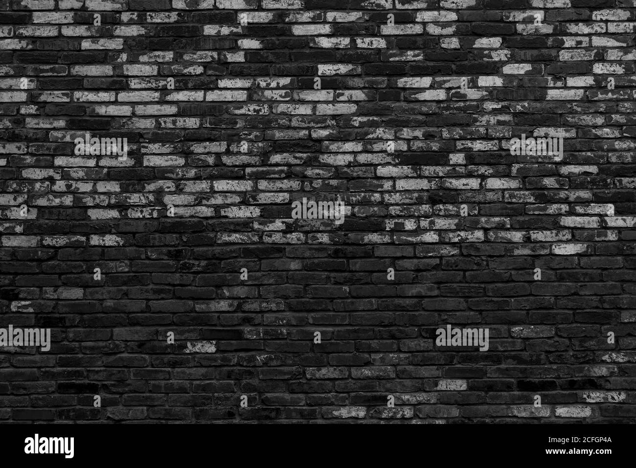 Black brick building wall. Interior of a modern loft. Background for ...