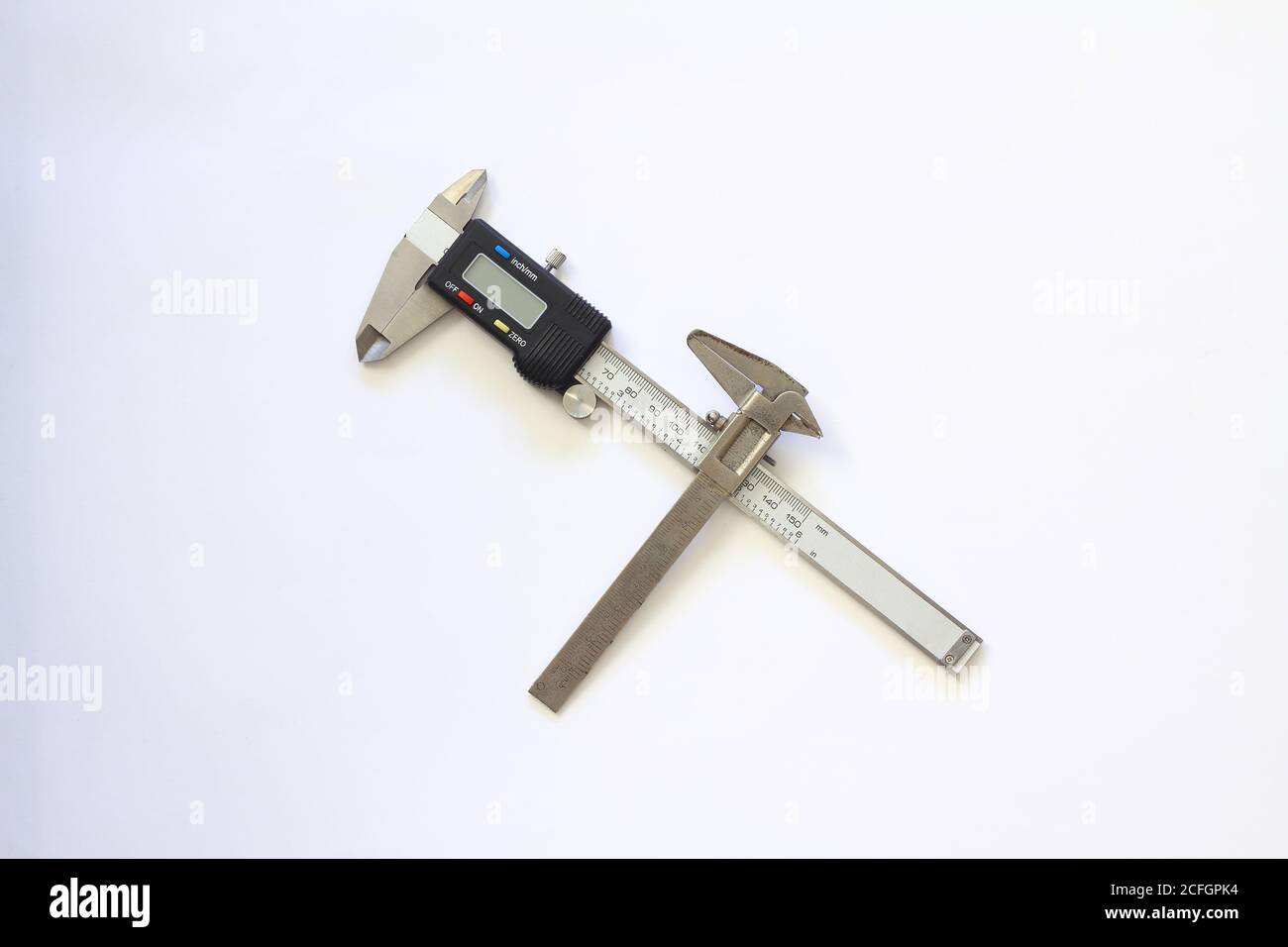 Very old used rusty iron calipers and Digital electronic vernier ...