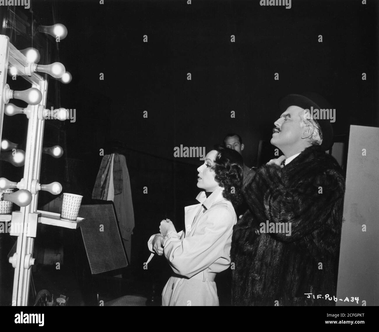 Dolores Del Rio And Orson Welles Check Their Costumes And Make Up In