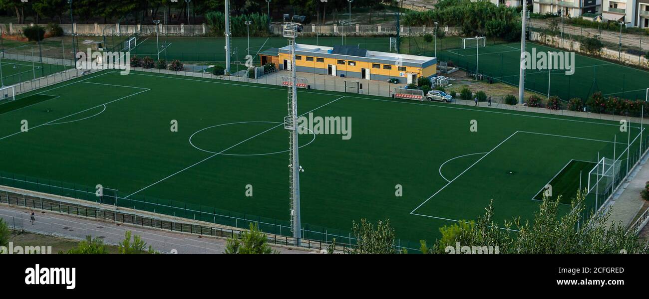 aerial view real empty football soccer fields, playground in a city ...