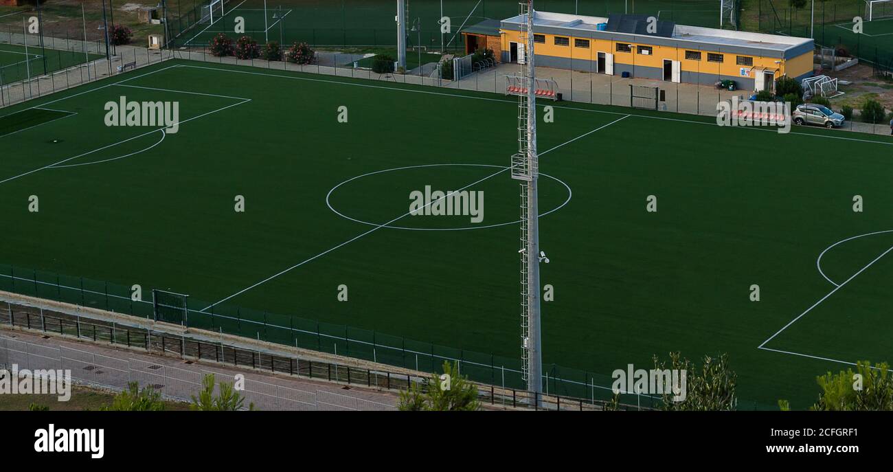 aerial view real empty football soccer field, playground in a city ...