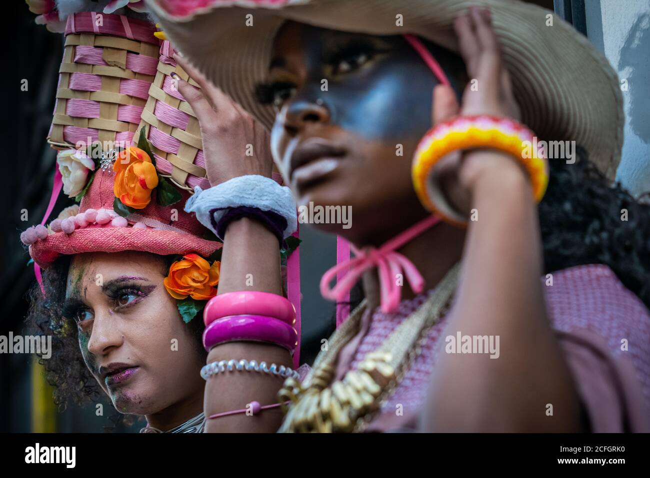 Models take part in a colourful flashmob street fashion show on Regent ...
