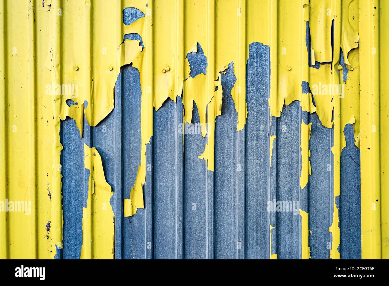 Yellow peeled iron tin fence lined background. Metal texture Stock ...