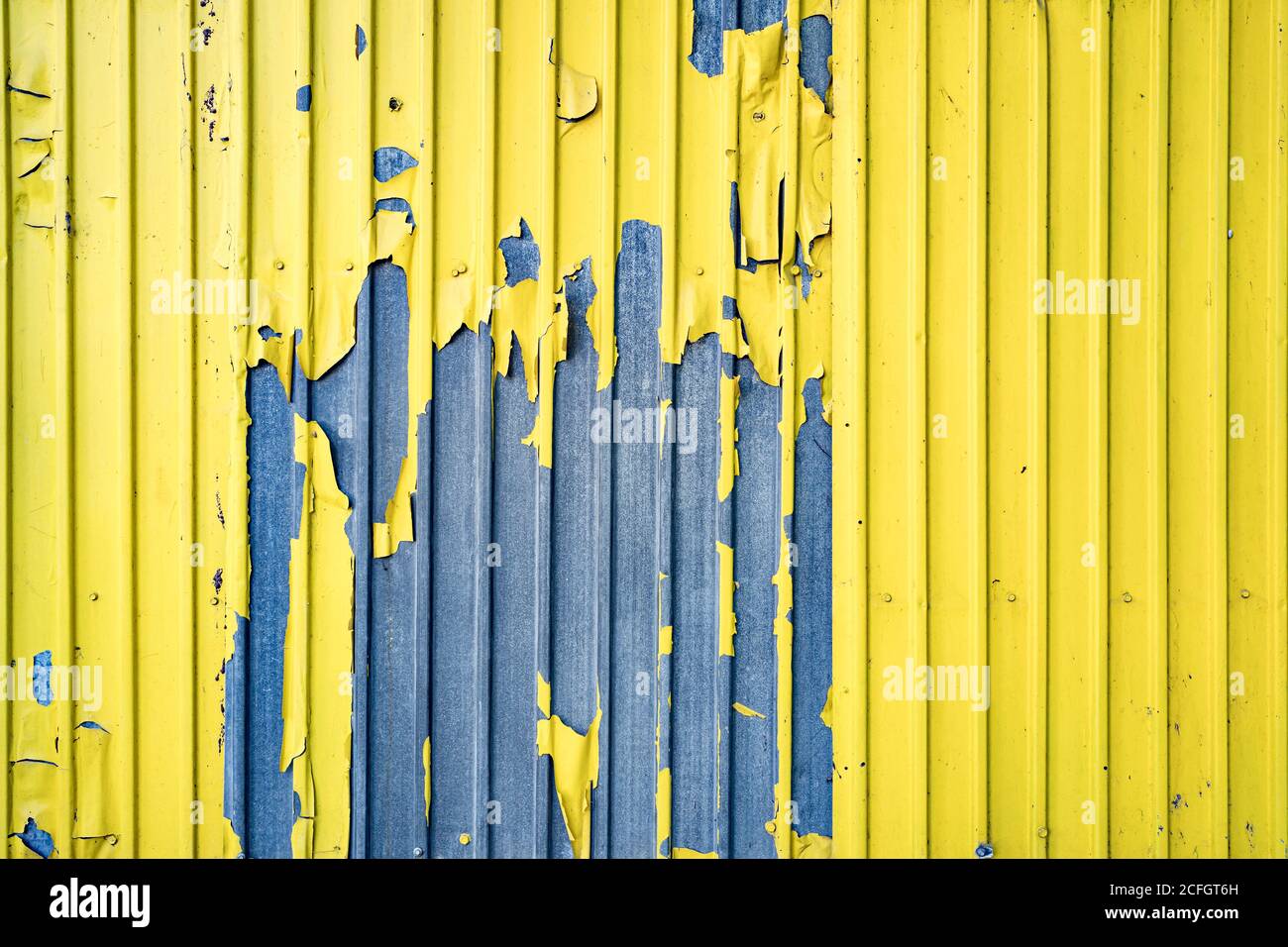 Yellow peeled iron tin fence lined background. Metal texture Stock ...