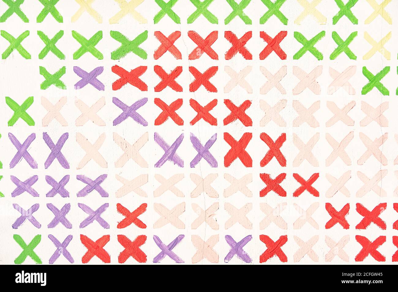 Colorful repetitive cross marks on white background Stock Photo - Alamy