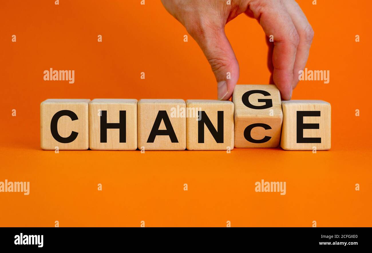 Hand flips a cube and changes the word 'change' to 'chance'. Beautiful ...