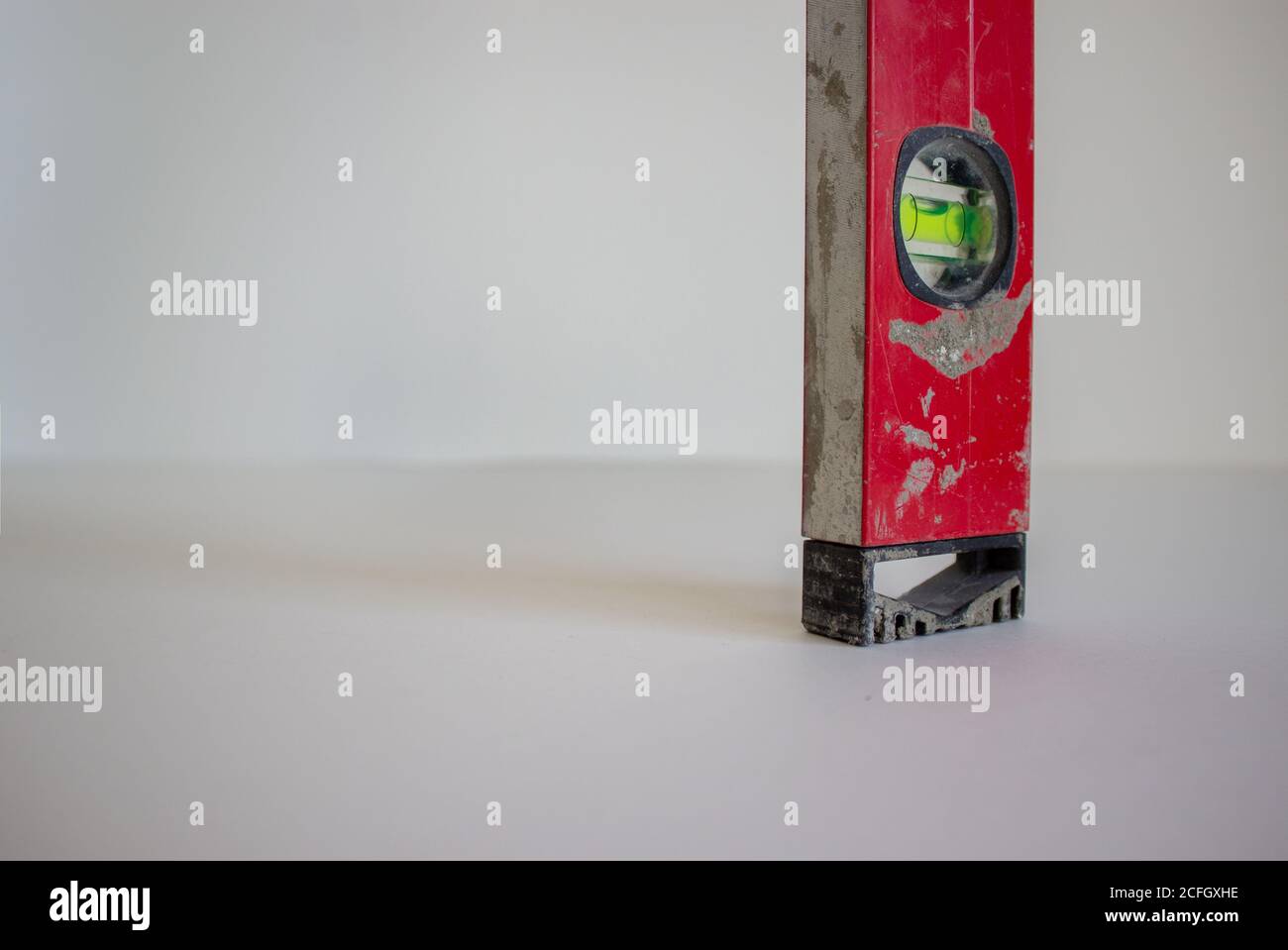 Building tool level. Red water level tool isolated on white background ...