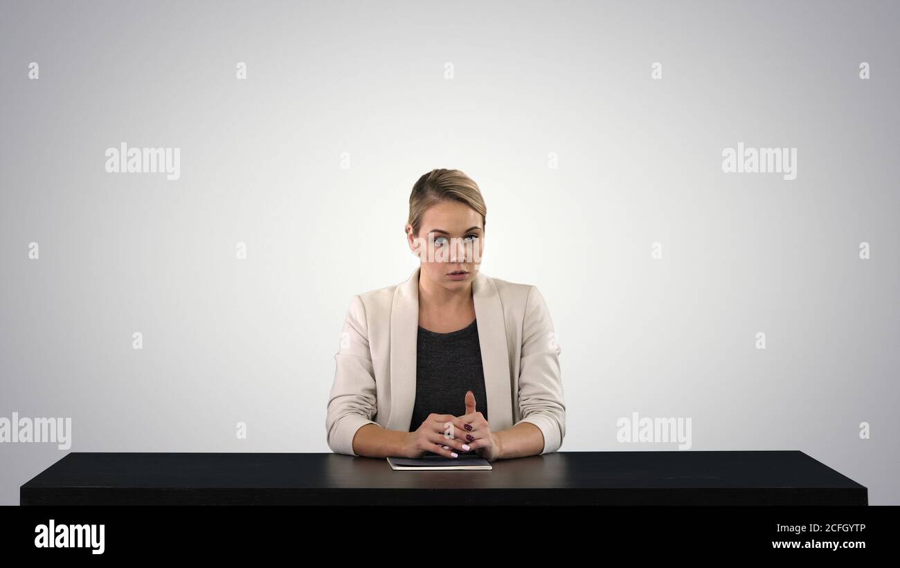 A female newsreader presenting the news, add your own text or image ...