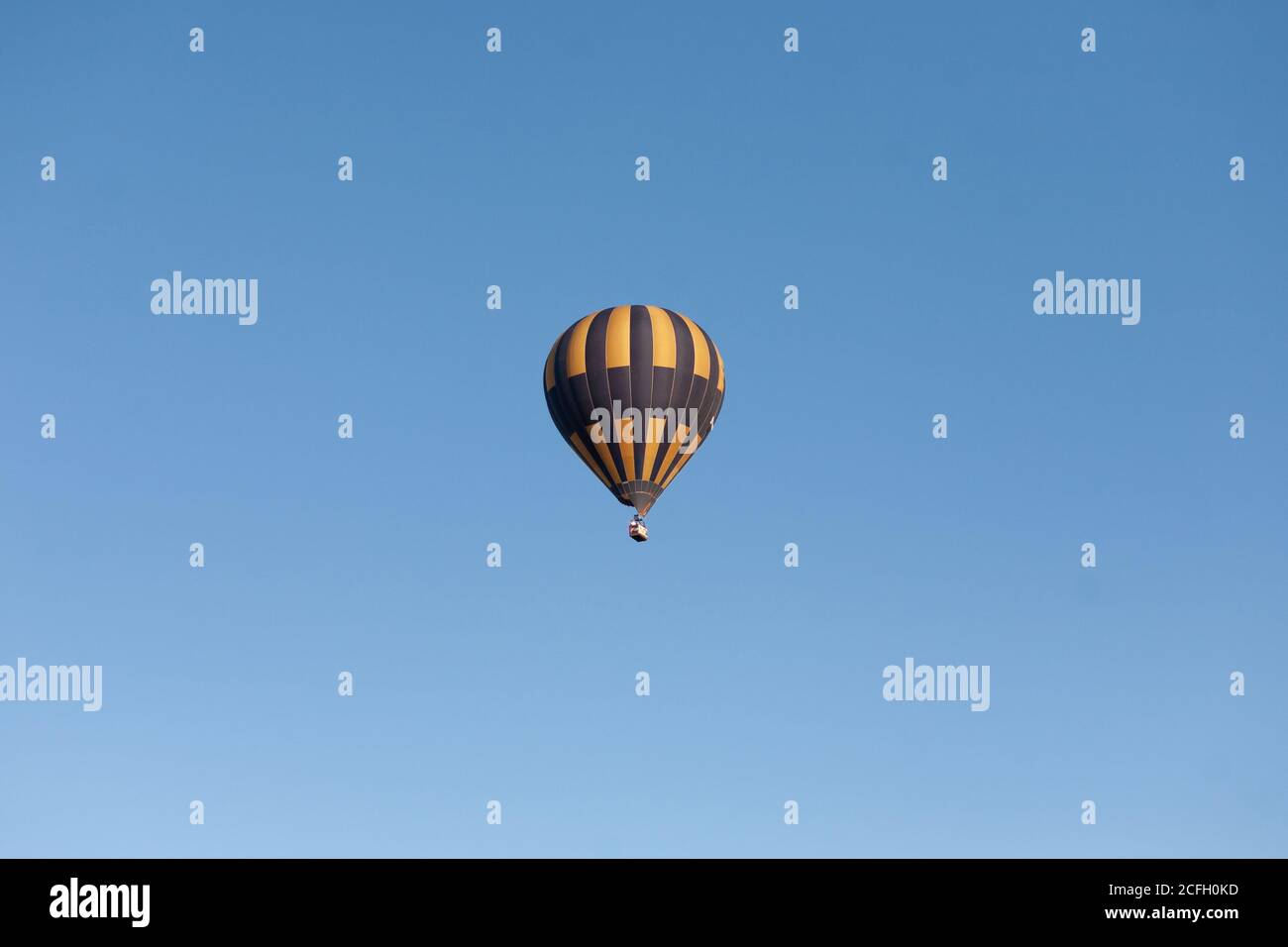 Colorful hot air balloon in morning sky Stock Photo - Alamy