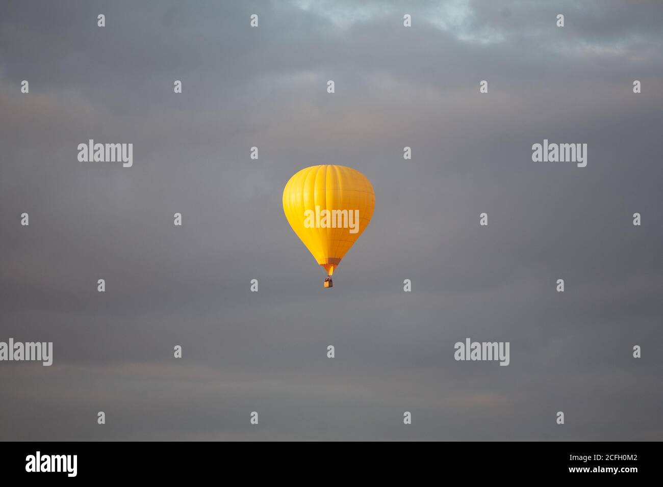 Colorful hot air balloon in morning sky Stock Photo - Alamy