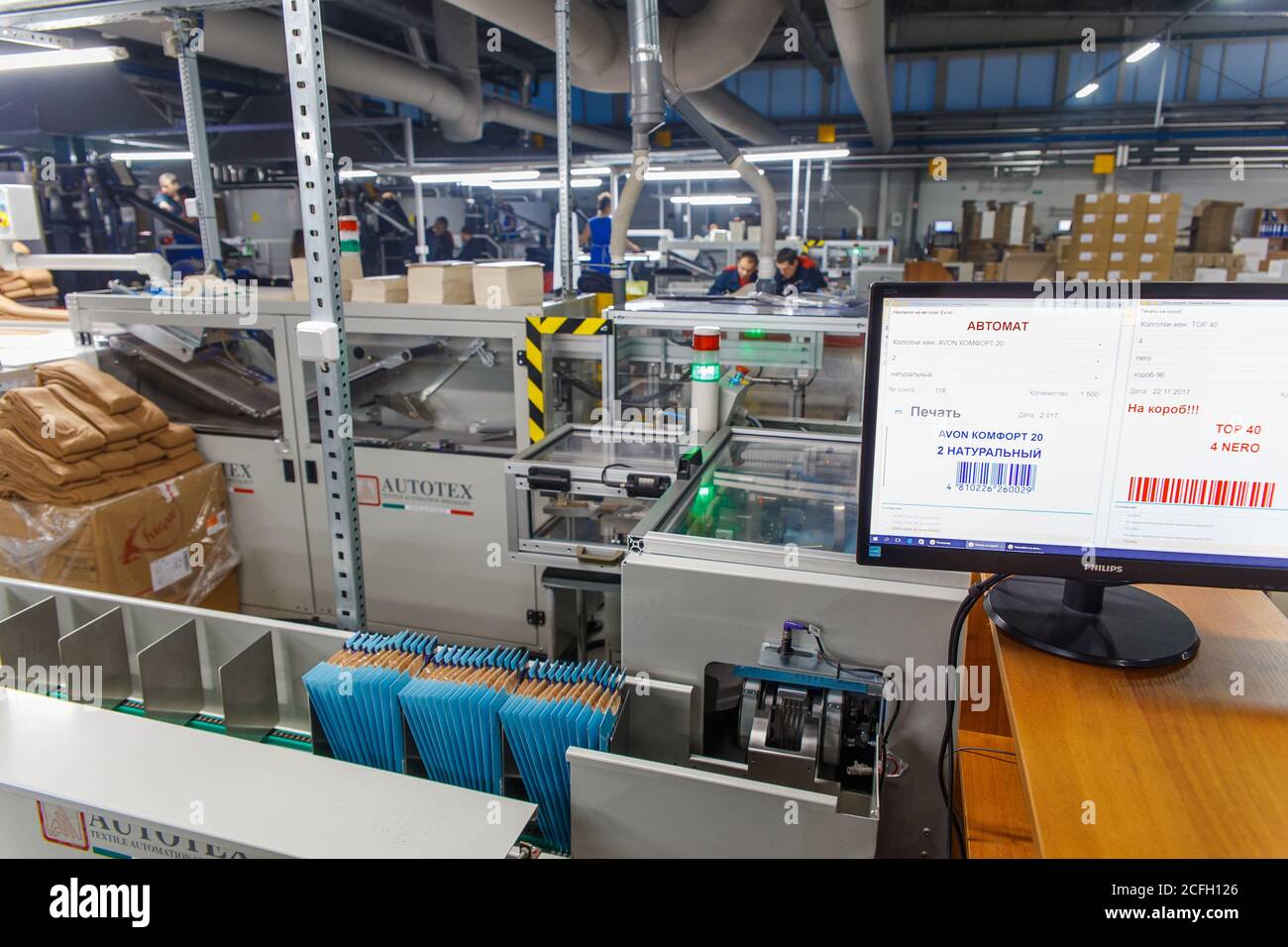 Worker garment industry packing hi-res stock photography and images - Alamy