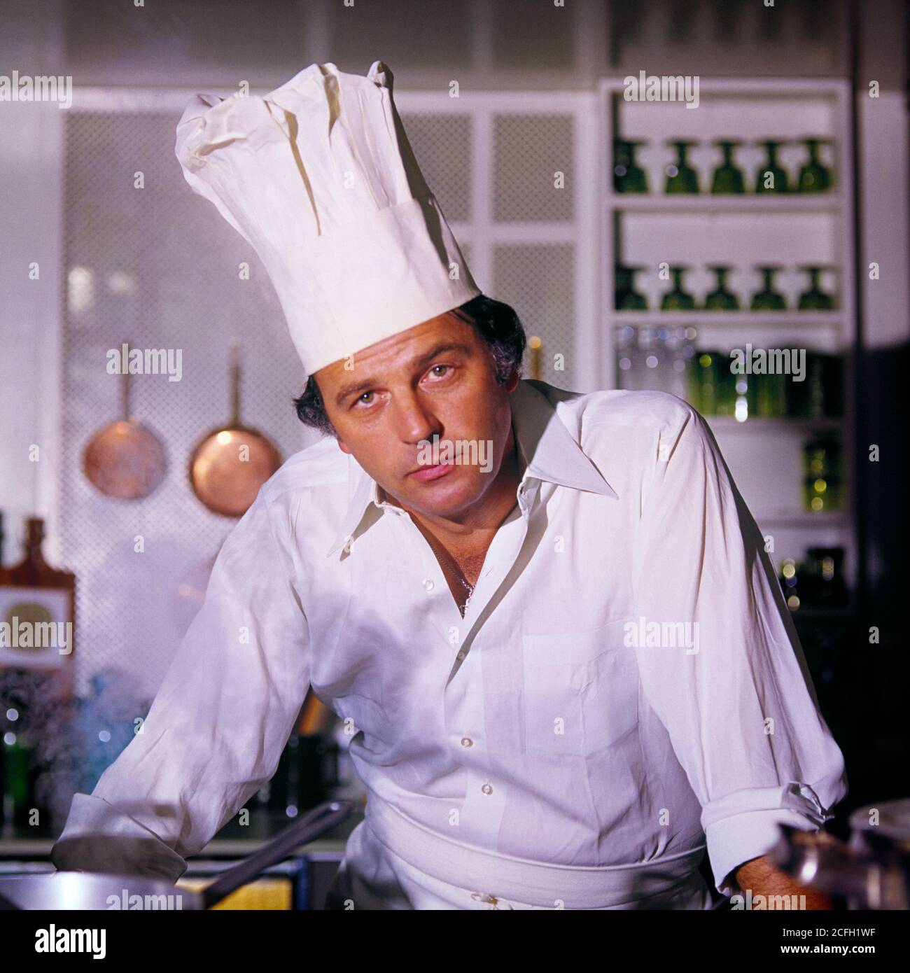 1970s 1980s 1990s SERIOUS MAN CHEF WEARING TOQUE IN RESTAURANT KITCHEN ...