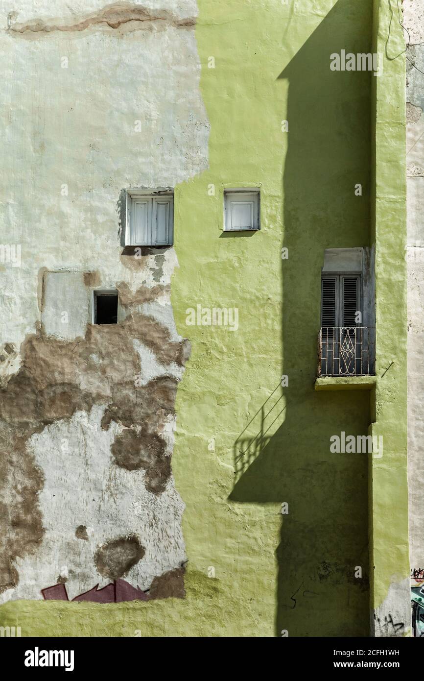 Havana, Cuba - 8 February 2015: Slums and ruined buildings along ...