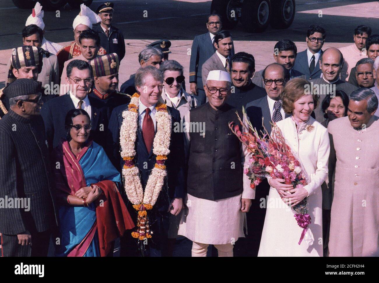 Officials of India welcome Jimmy Carter and Rosalynn Carter during an ...