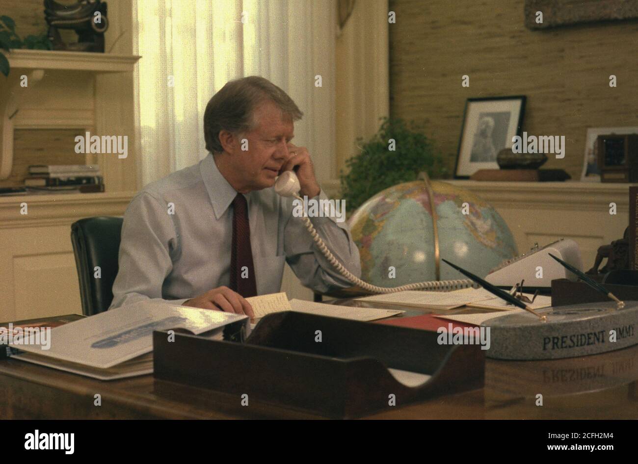 Jimmy Carter at his desk in his private study ca. 21 November 1978 ...