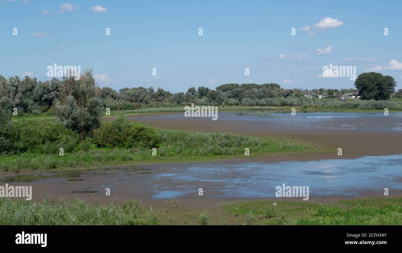 dried out lake in a Dutch polder landscape in the Ooijpolder in the ...