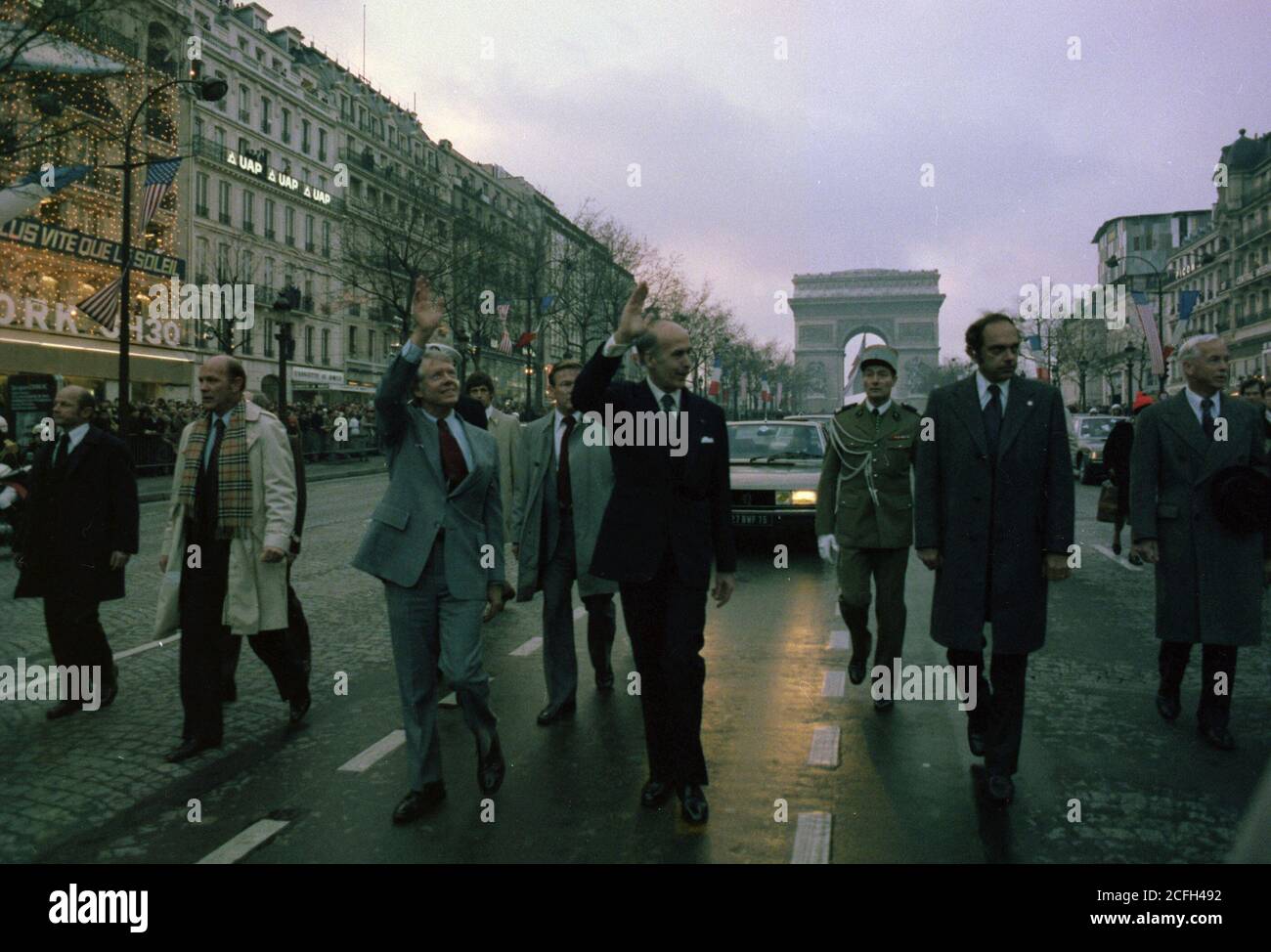 Jimmy Carter and President Giscard d'Estaing walk down the Champs ...